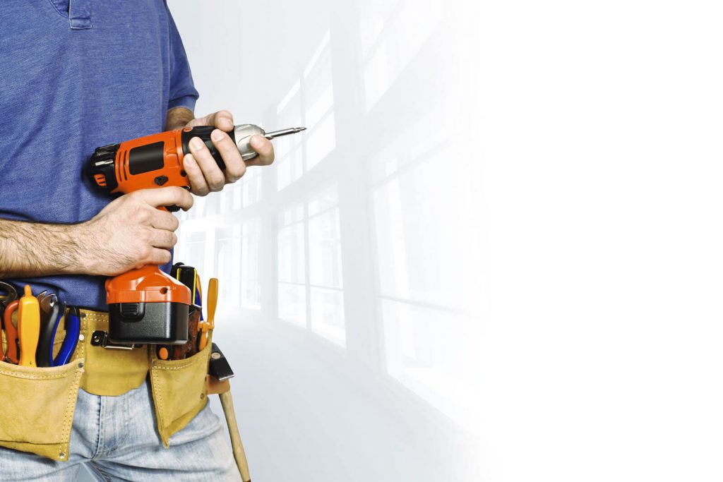 Man-doing-handyman-work - Helpful Hands Handyman